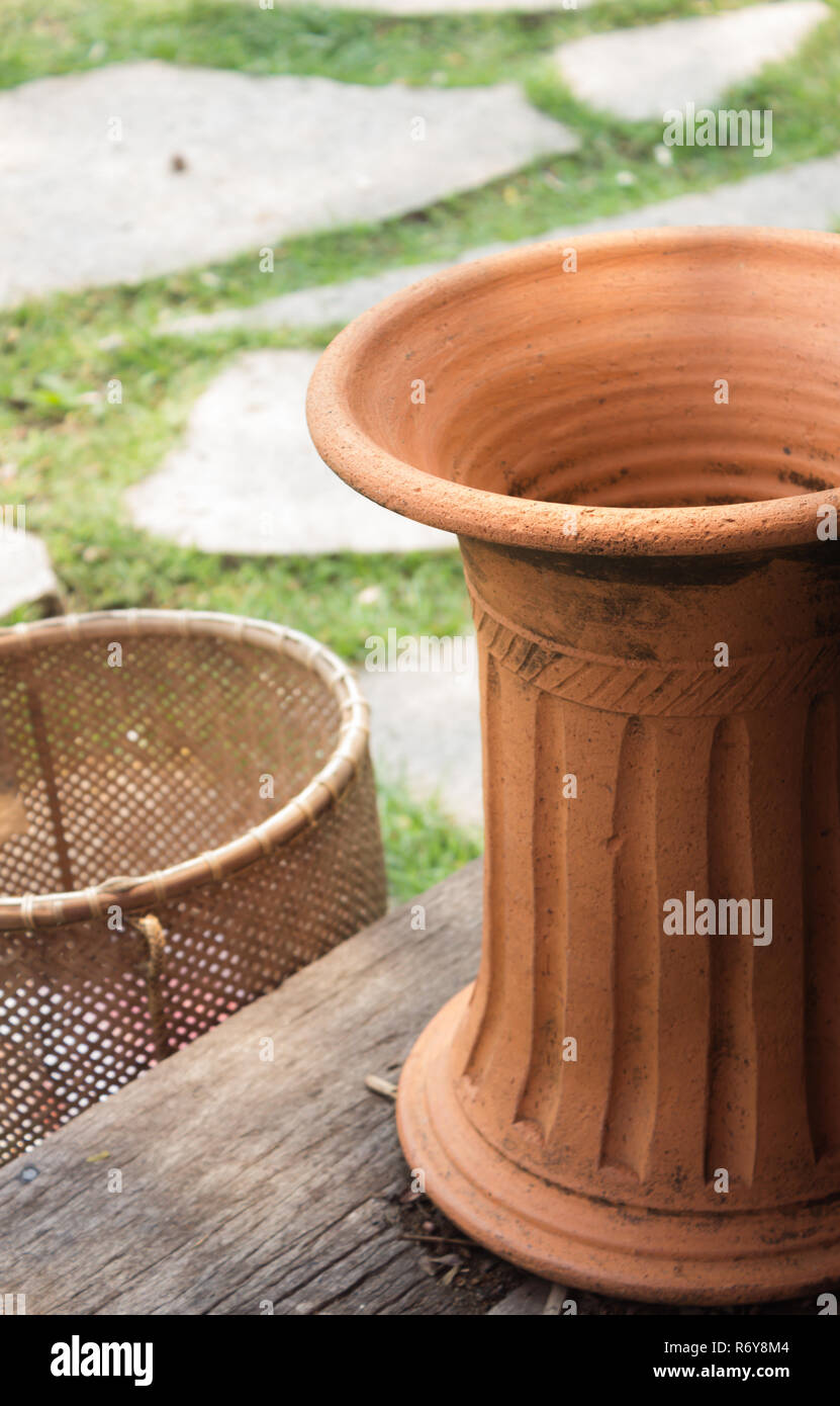 Pottery of a jar and basket Stock Photo - Alamy