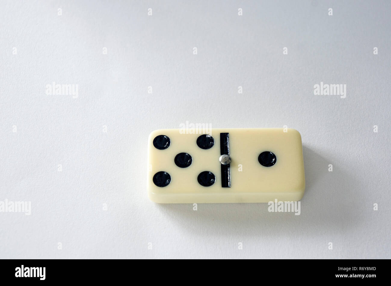 domino isolated white background one five game piece Stock Photo - Alamy