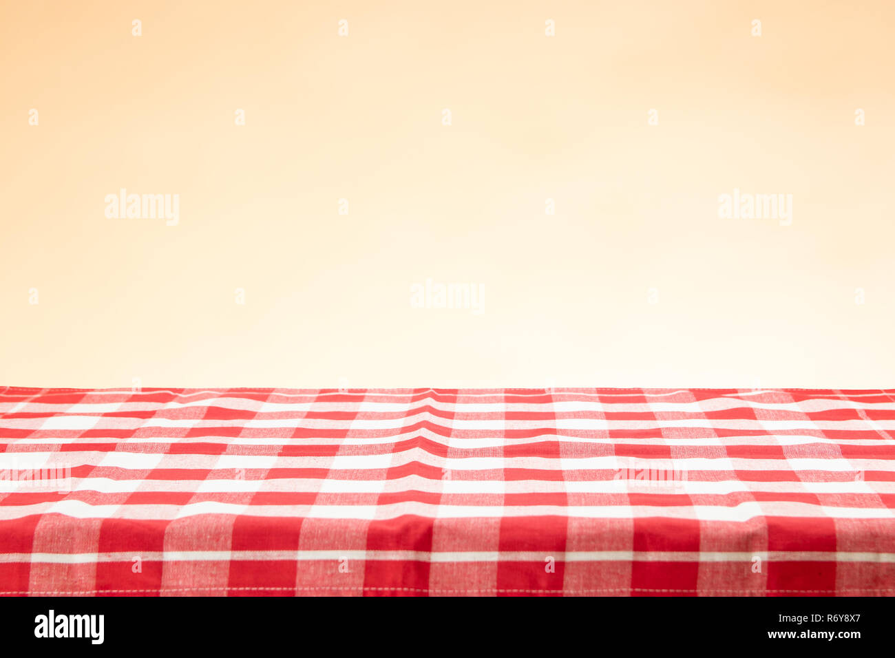 checkered tablecloth and on bright background. for your food and ...