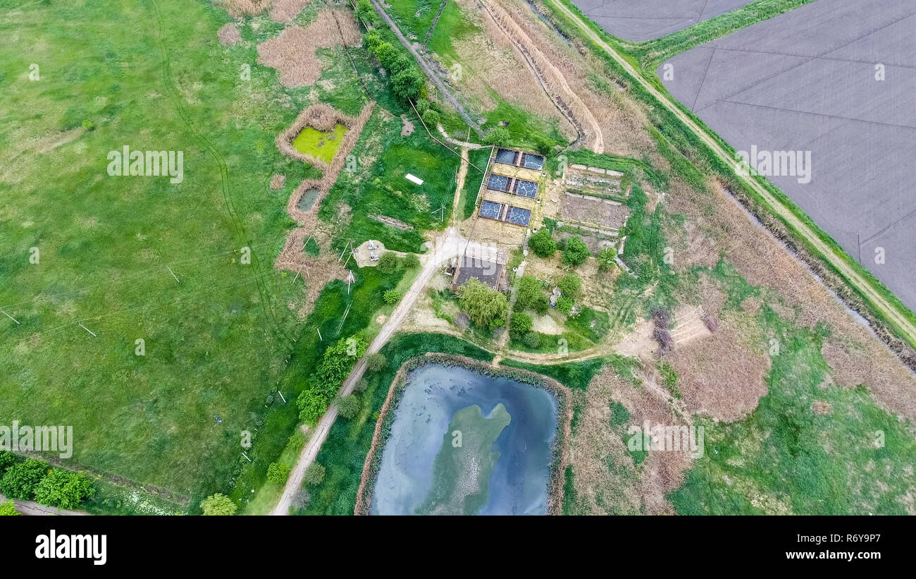 Purification facilities, sewage treatment pools. Landfill of garbage ...