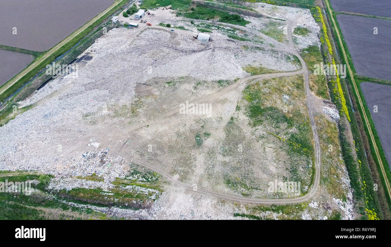 garbage dump with heaps of garbage and treatment facilities. Landfill ...