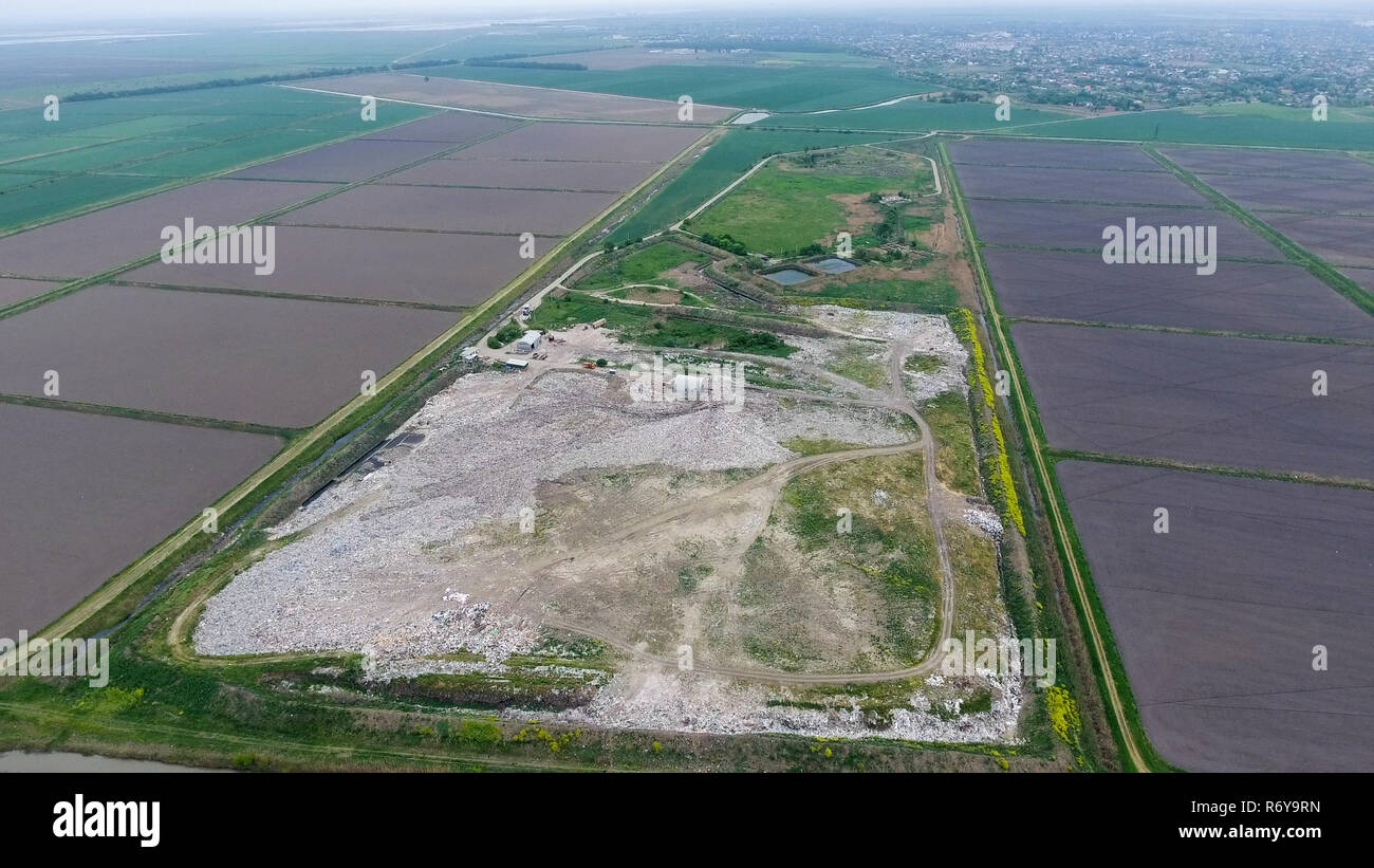 garbage dump with heaps of garbage and treatment facilities. Landfill ...