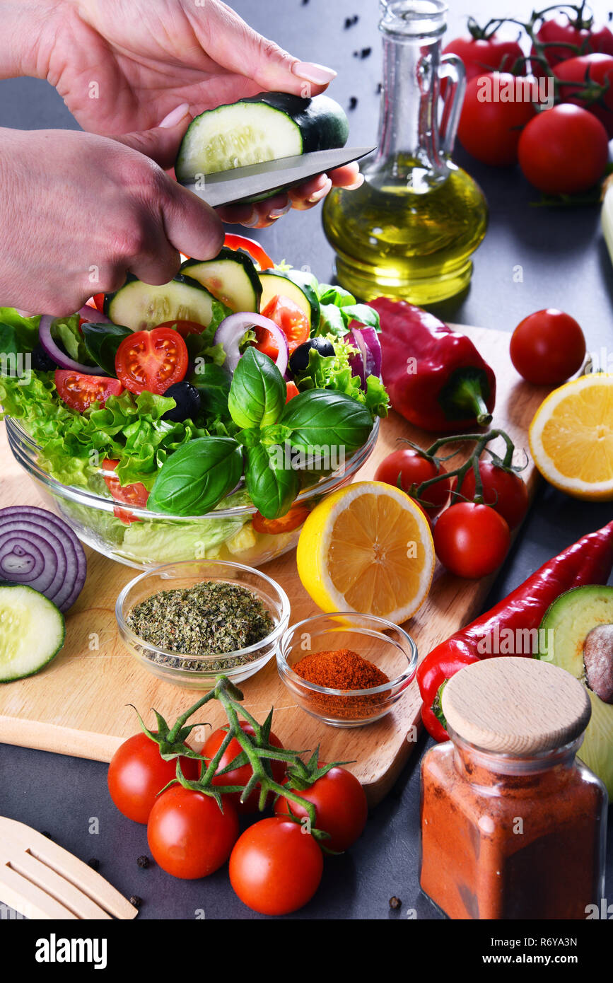 Preparation of a vegetable salad from fresh organic ingredients Stock ...
