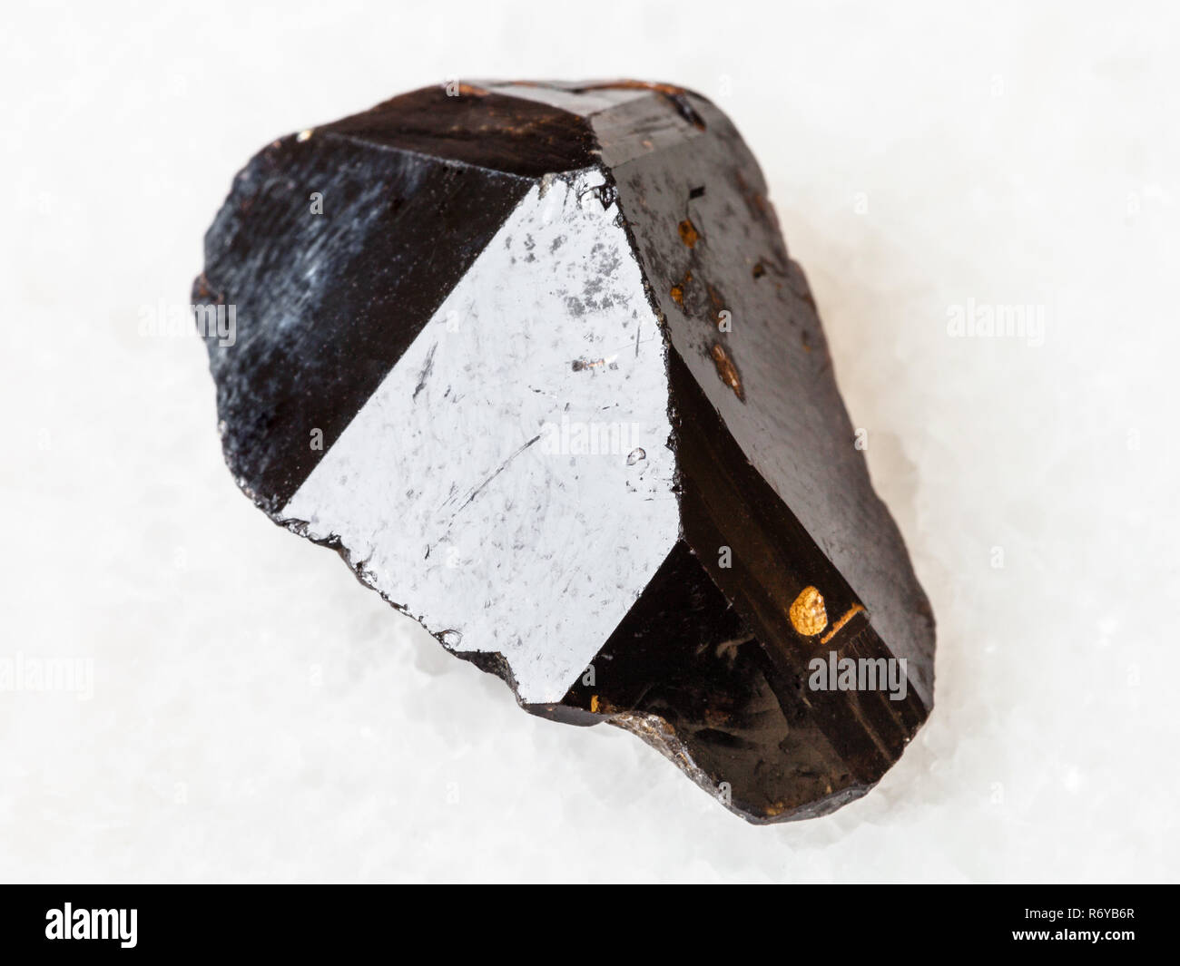 raw crystal of Cassiterite stone on white Stock Photo - Alamy