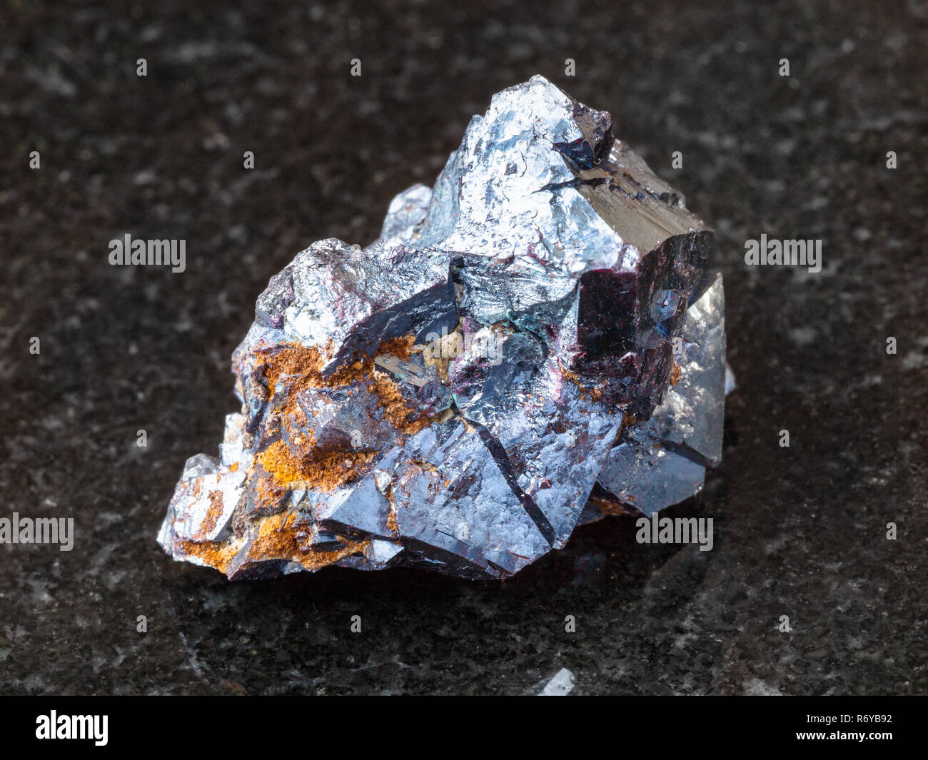 crystals of Cuprite stone on black granite Stock Photo - Alamy