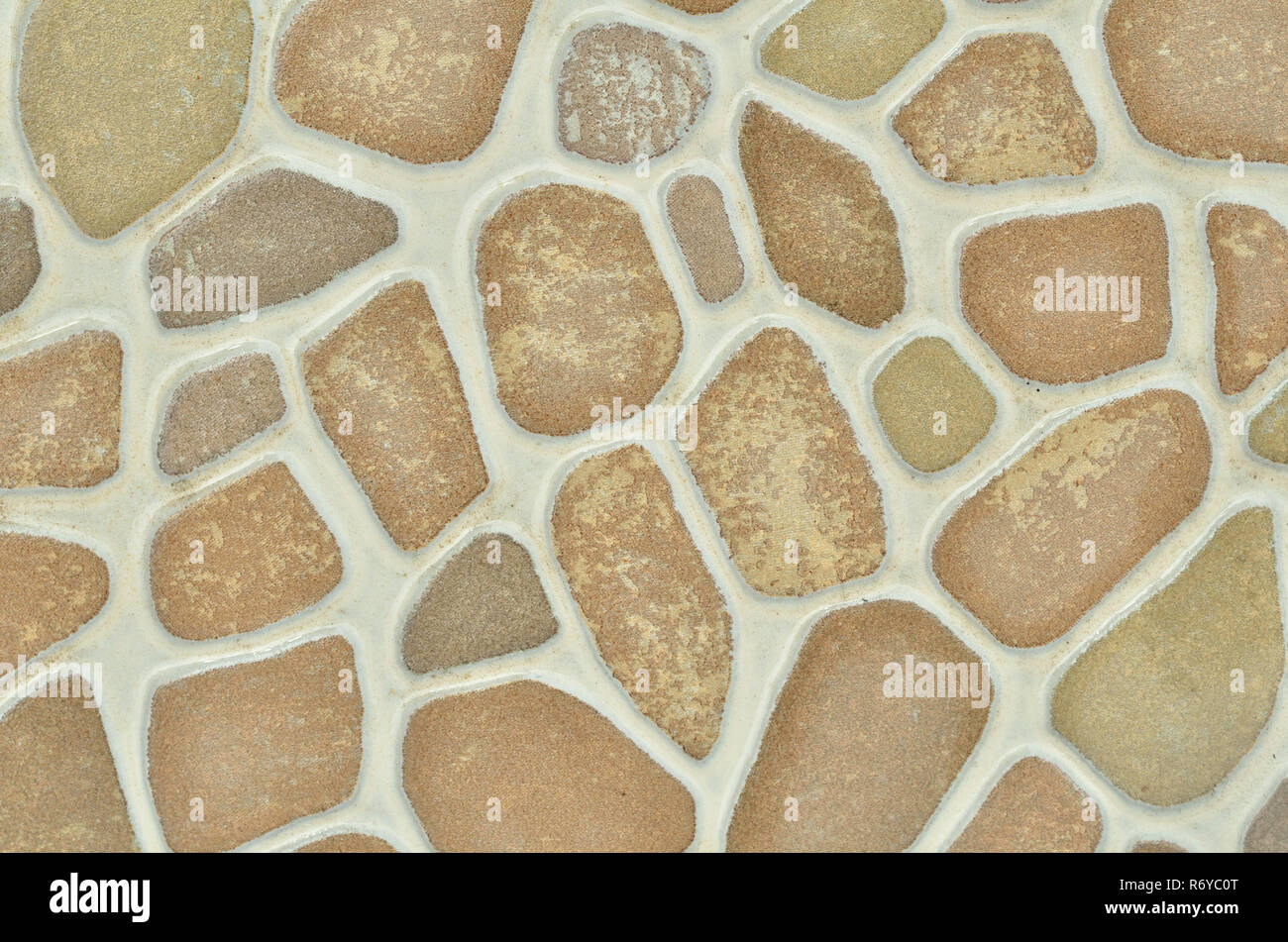 Stone tiles with a pattern of round stones Stock Photo - Alamy