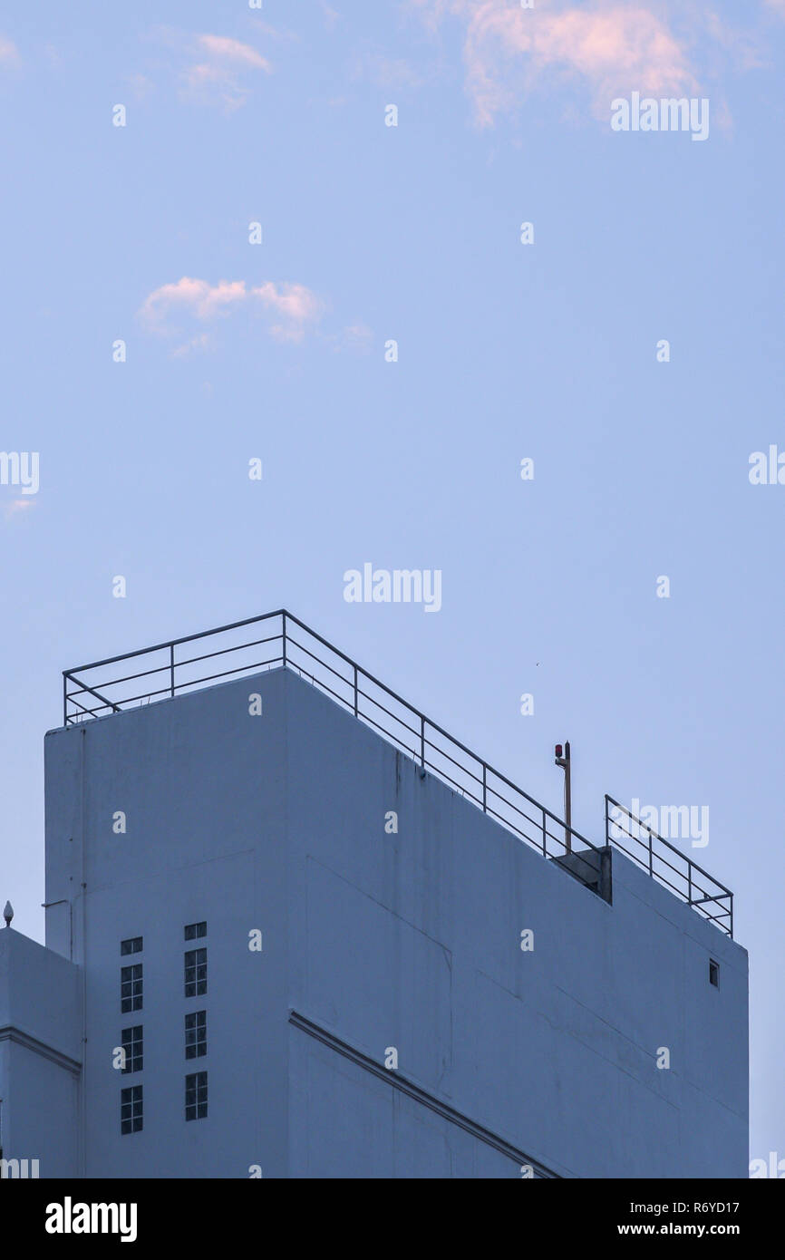 Top of urban office building sunset sky Stock Photo - Alamy