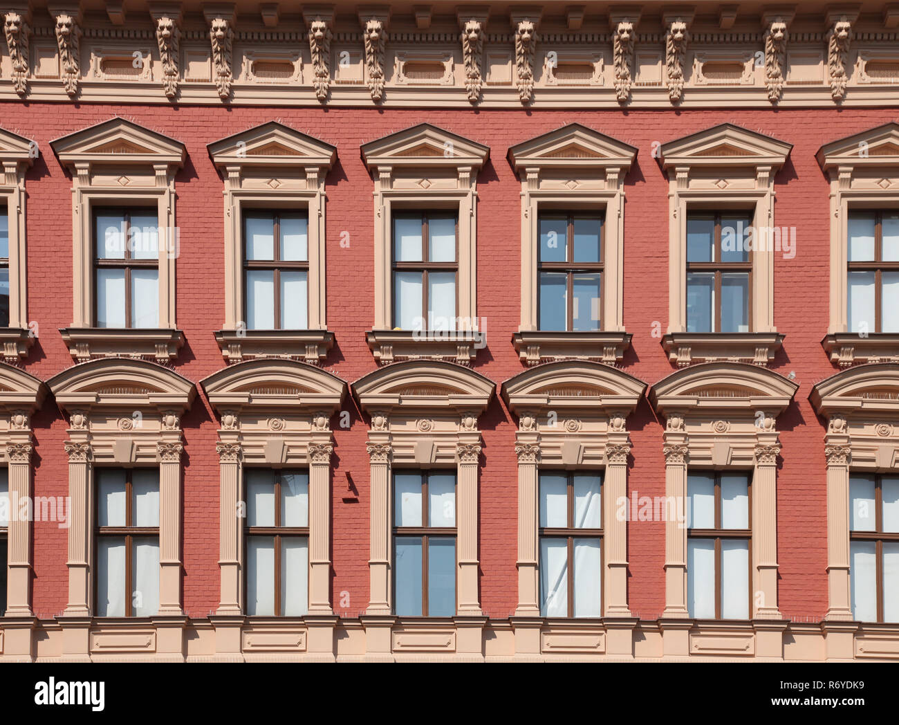 Windows in big red house Stock Photo - Alamy