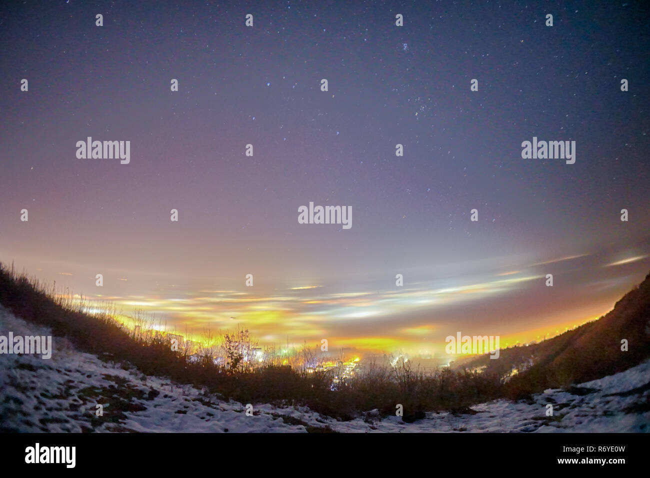 City under a thick fog shot from above with snow Stock Photo - Alamy