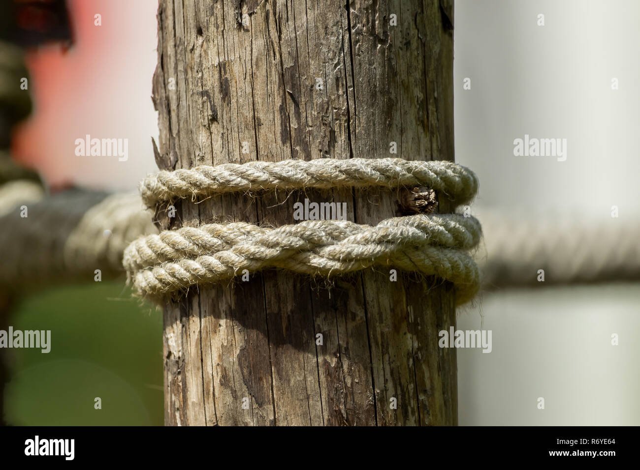 Wood logs tied rope hi-res stock photography and images - Alamy