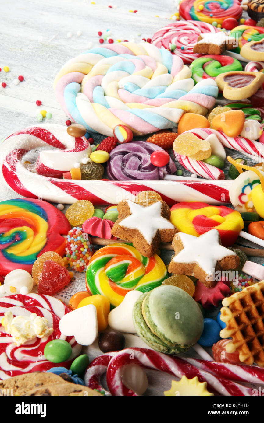 candies with jelly and sugar. colorful array of different childs sweets ...