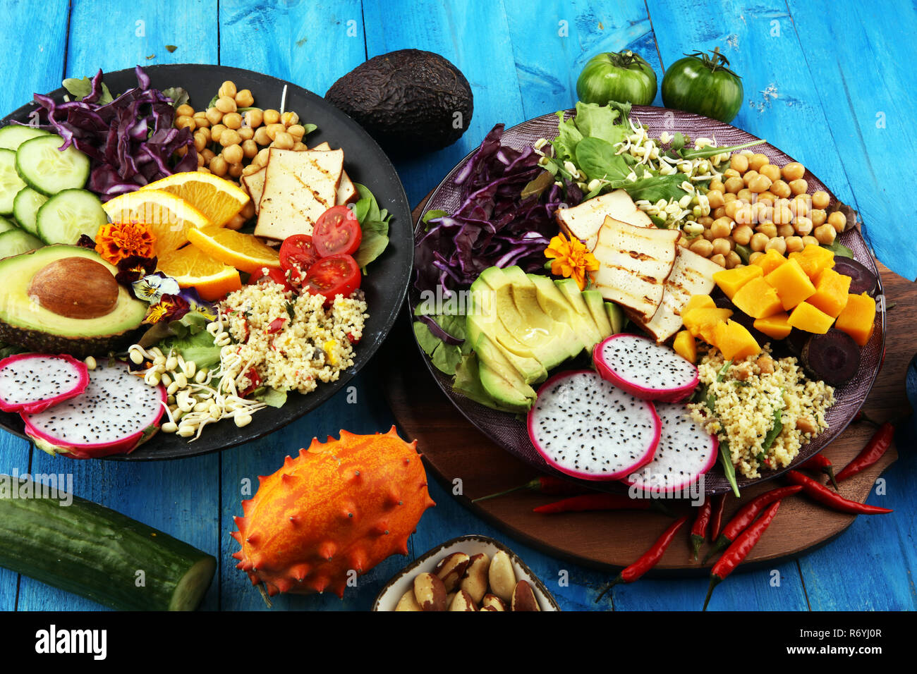 grilled tofu and dragon fruit buddha bowl with vegetable and humus ...