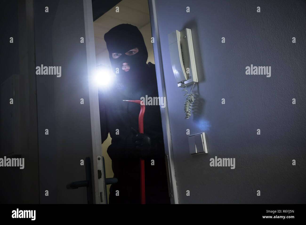 Thief Entering Into House Stock Photo - Alamy