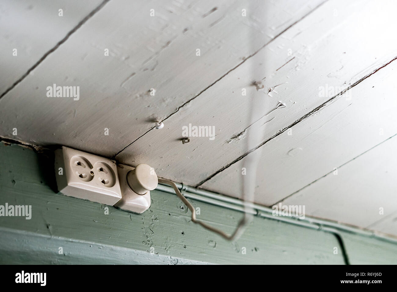 Outlets with a socket mounted at the ceiling in old house with ...