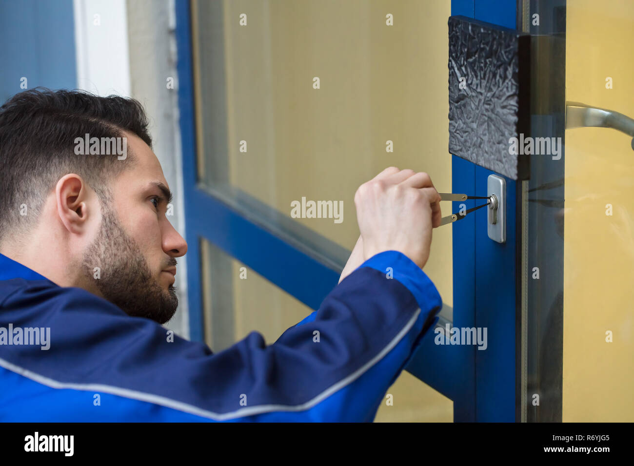 Man Peeking Door Stock Photos & Man Peeking Door Stock Images - Alamy