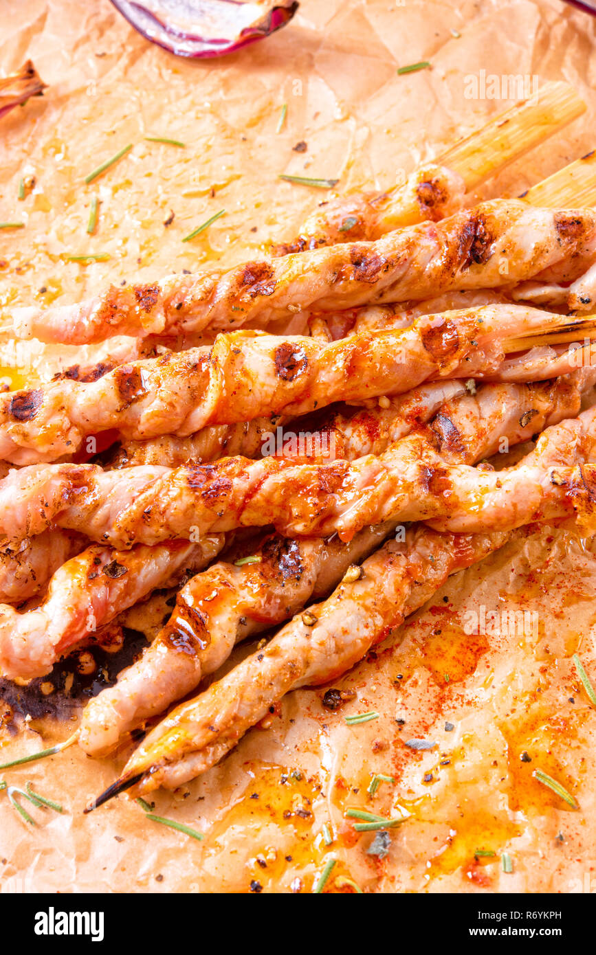 fresh and crispy rustic pork belly barbecue sticks Stock Photo - Alamy