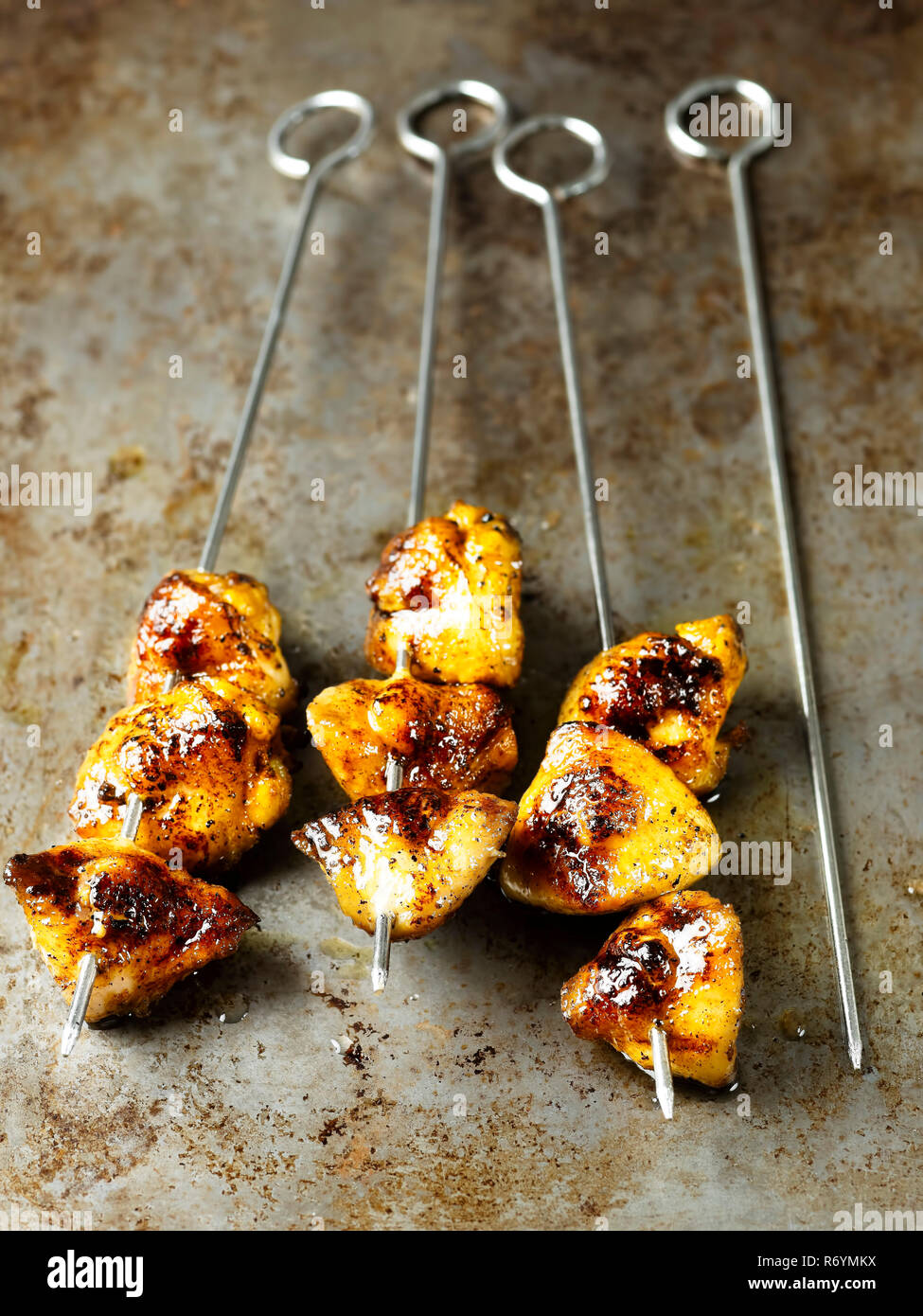 rustic golden barbecued chicken tail Stock Photo - Alamy