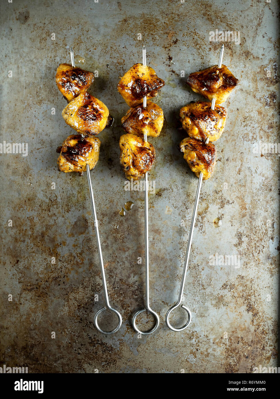 rustic golden barbecued chicken tail Stock Photo - Alamy