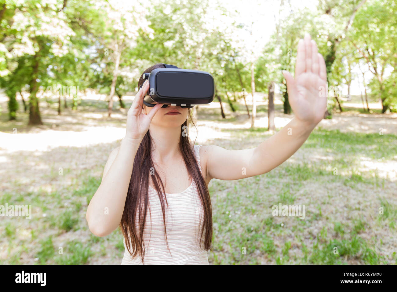 Woman wearing Virtual Reality Goggles Stock Photo - Alamy