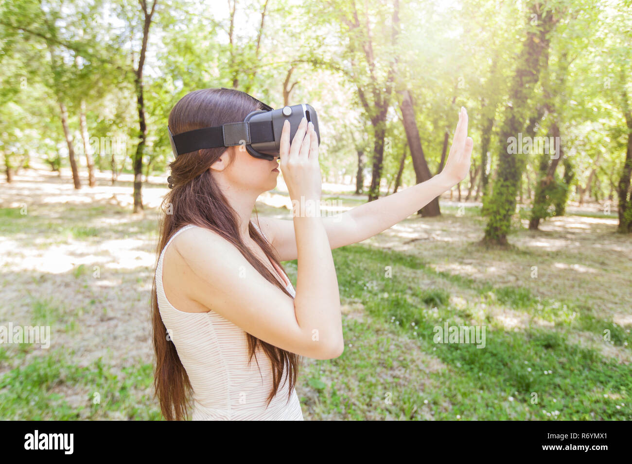 Woman wearing Virtual Reality Goggles Stock Photo - Alamy