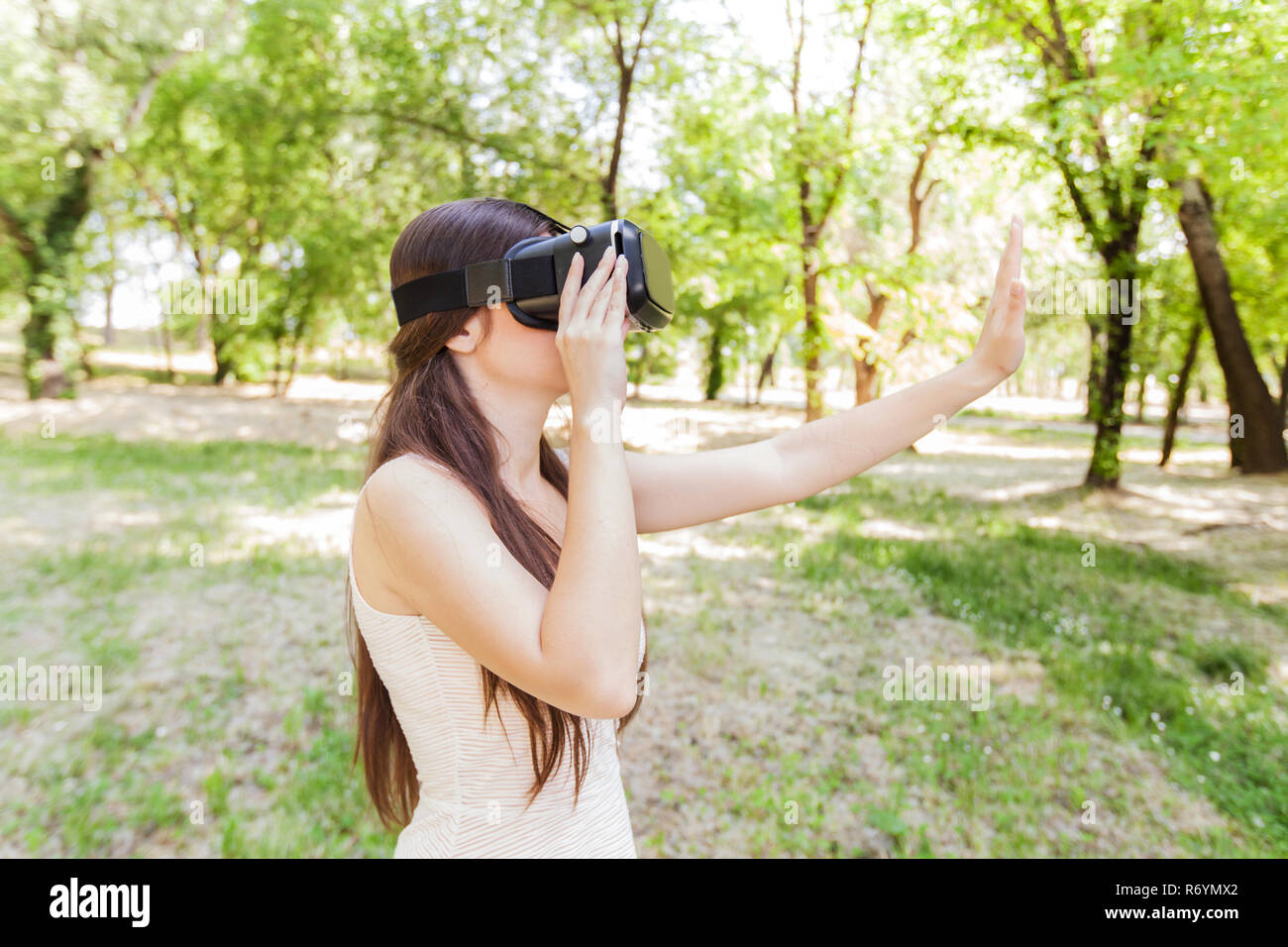 Woman wearing Virtual Reality Goggles Stock Photo - Alamy