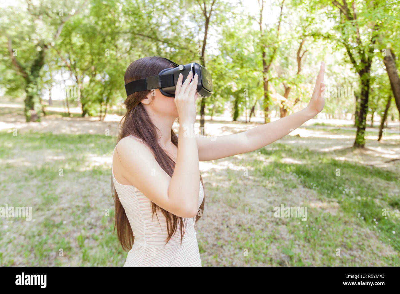 Woman wearing Virtual Reality Goggles Stock Photo - Alamy