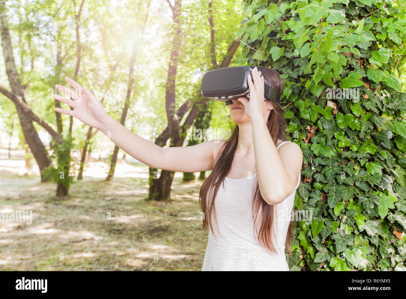 Woman wearing Virtual Reality Goggles Stock Photo - Alamy