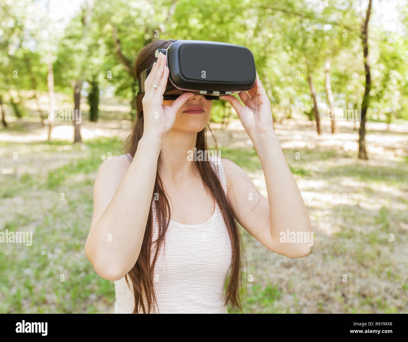 Woman wearing Virtual Reality Goggles Stock Photo - Alamy