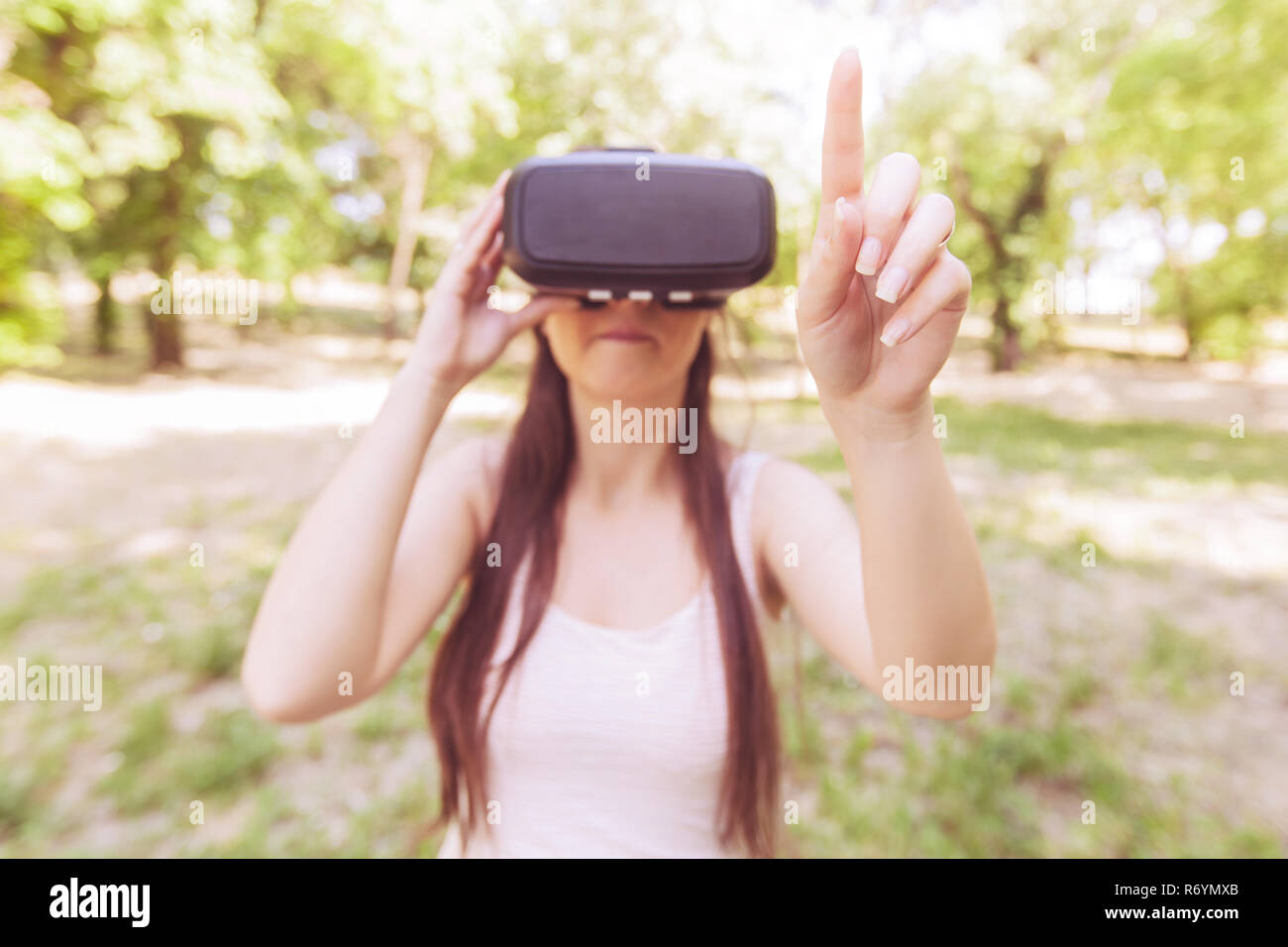 Woman wearing Virtual Reality Goggles Stock Photo - Alamy