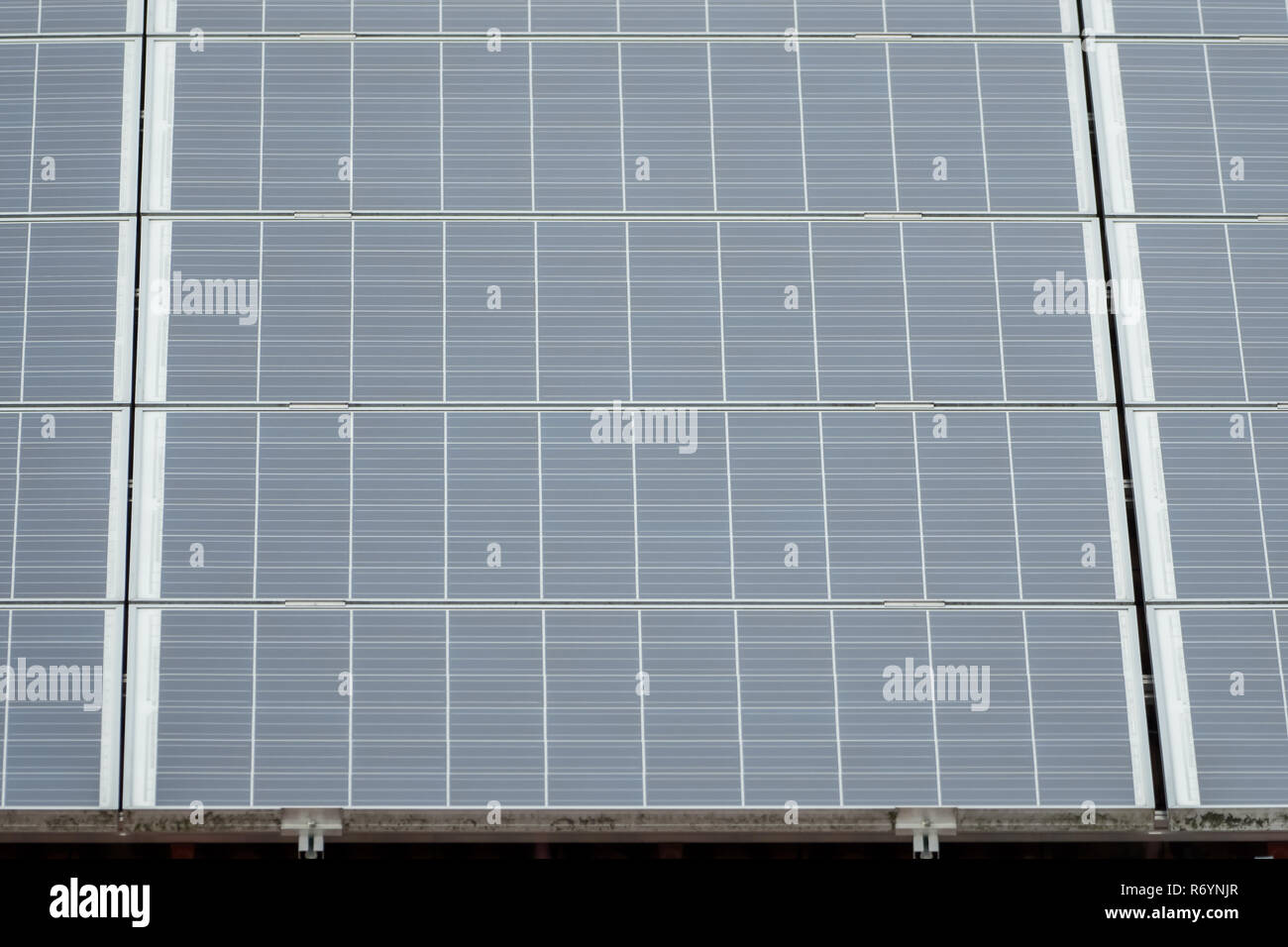 A solar system on a roof, sky in the background Stock Photo - Alamy