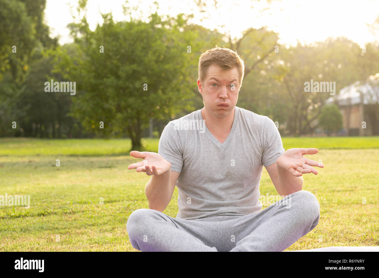 Shrugging pose hi-res stock photography and images - Alamy