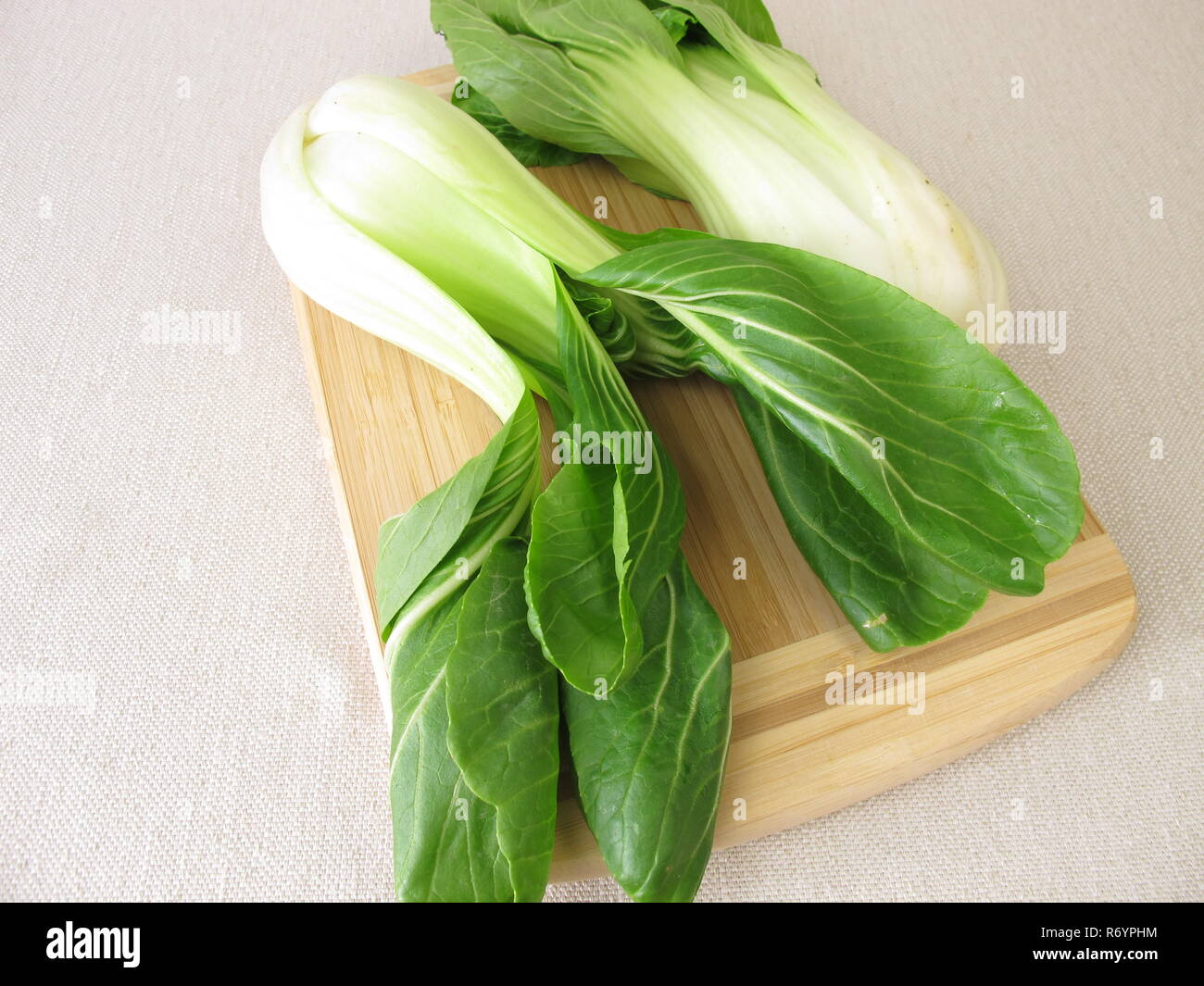pak choi on a cutting board Stock Photo - Alamy