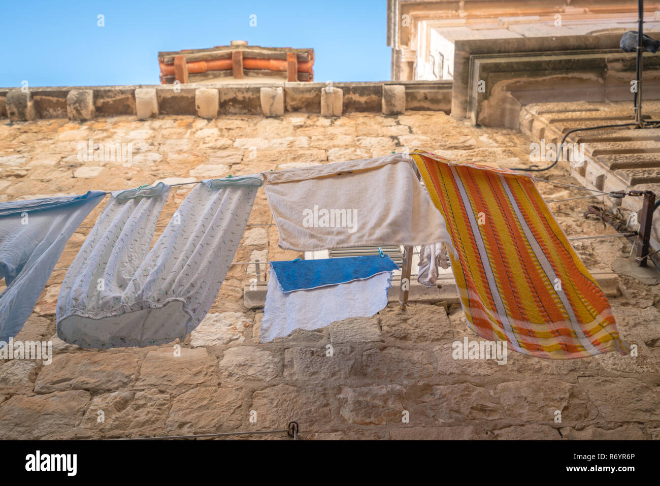 Laundry drying on a clothesline Stock Photo - Alamy