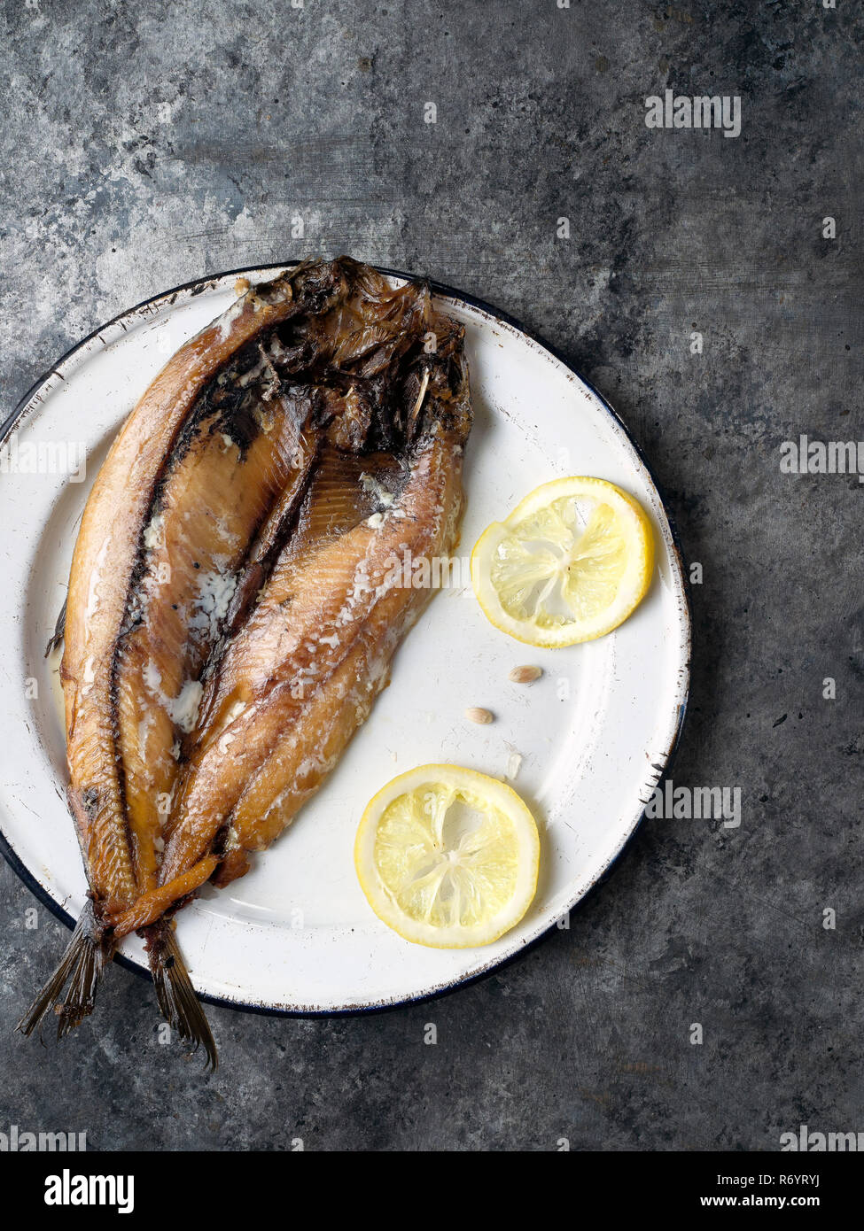 rustic smoked english kippers Stock Photo - Alamy