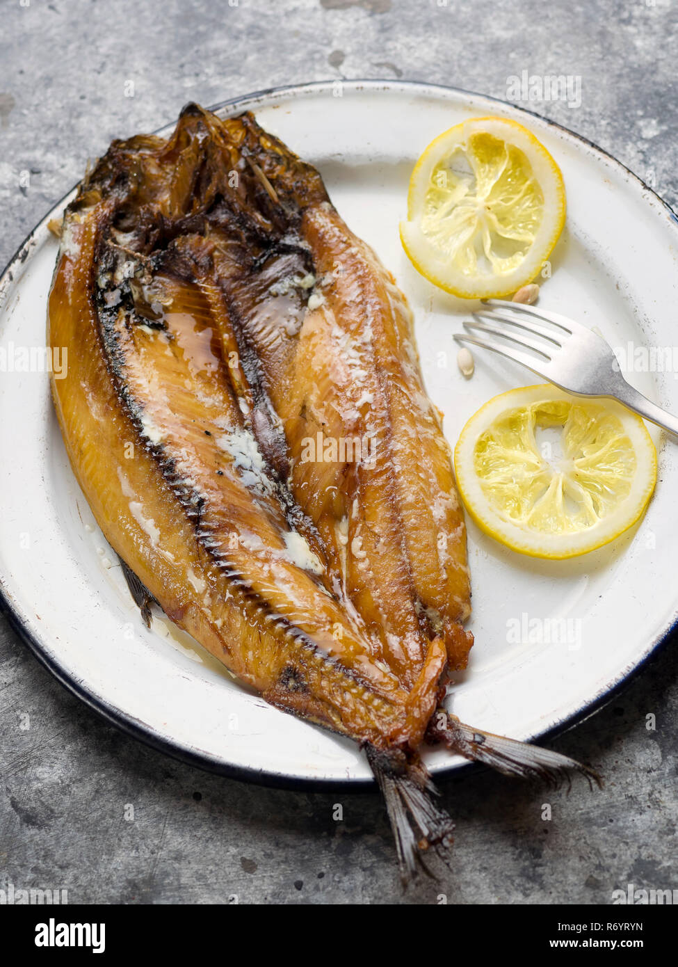 rustic smoked english kippers Stock Photo - Alamy