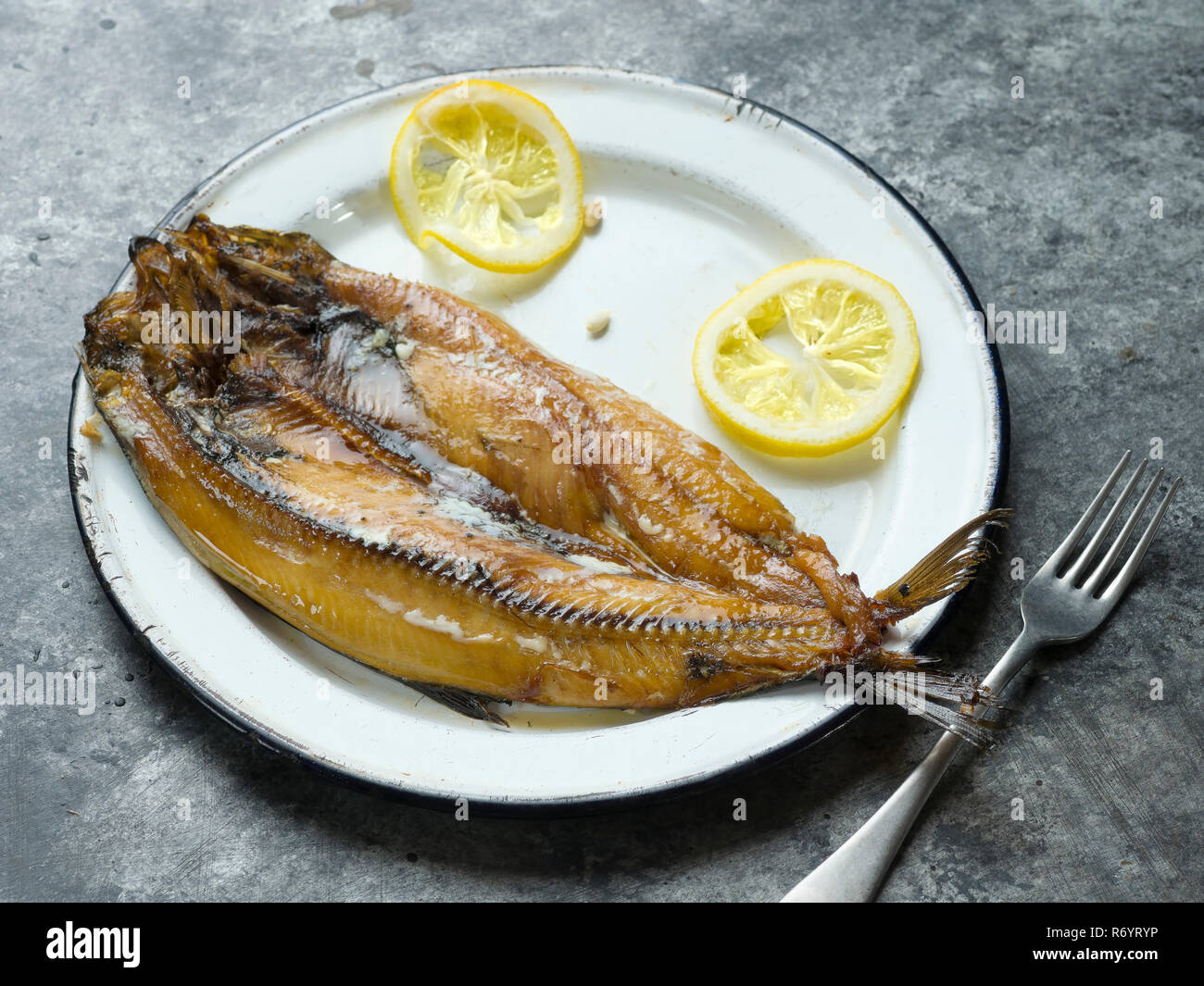 rustic smoked english kippers Stock Photo - Alamy