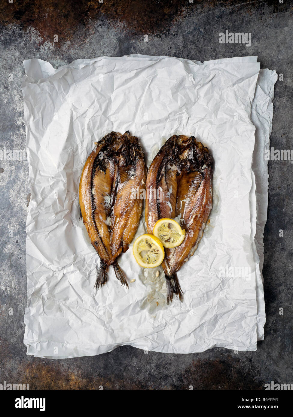 rustic smoked english kippers Stock Photo - Alamy