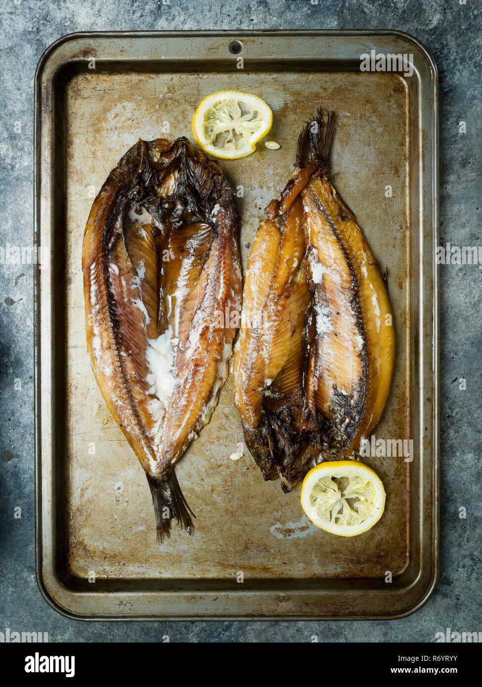rustic smoked english kippers Stock Photo - Alamy