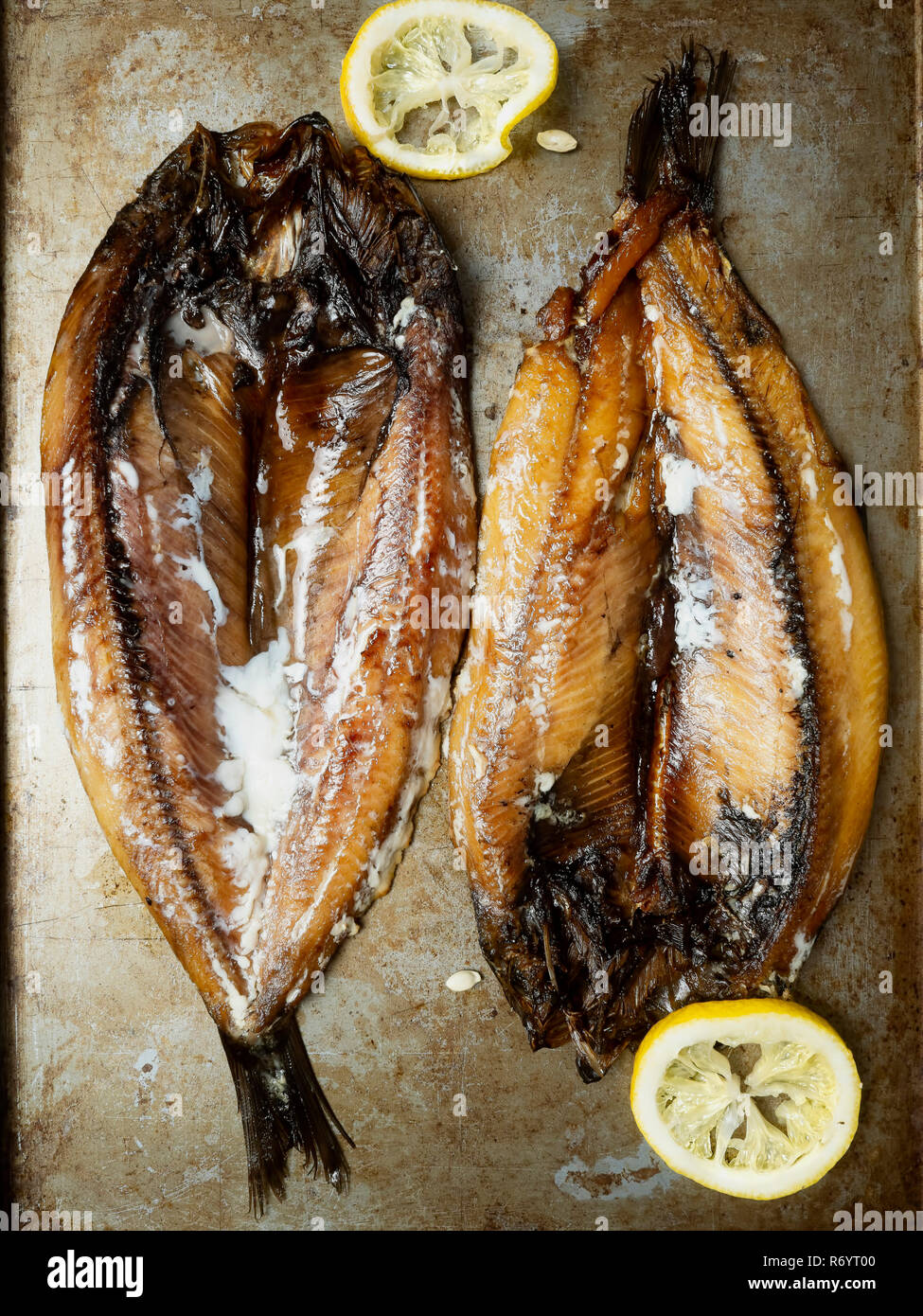 rustic smoked english kippers Stock Photo - Alamy