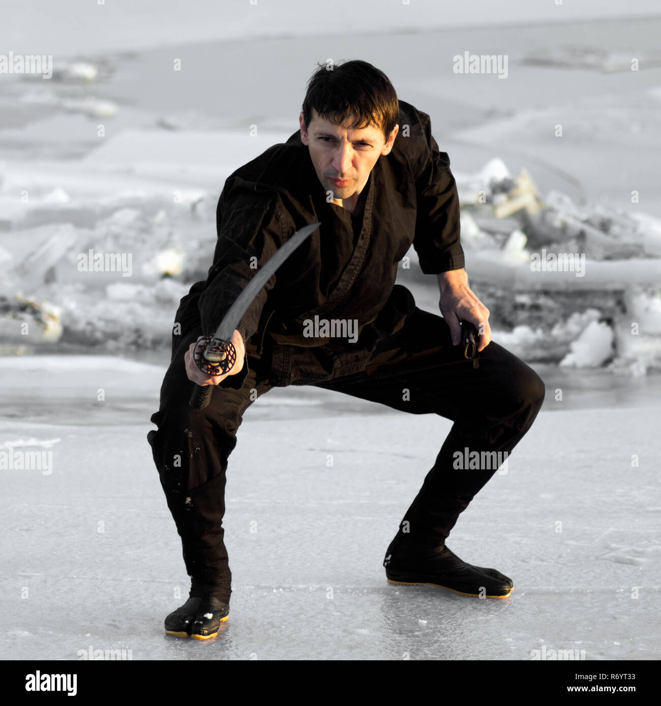 Man sword on black hi-res stock photography and images - Alamy