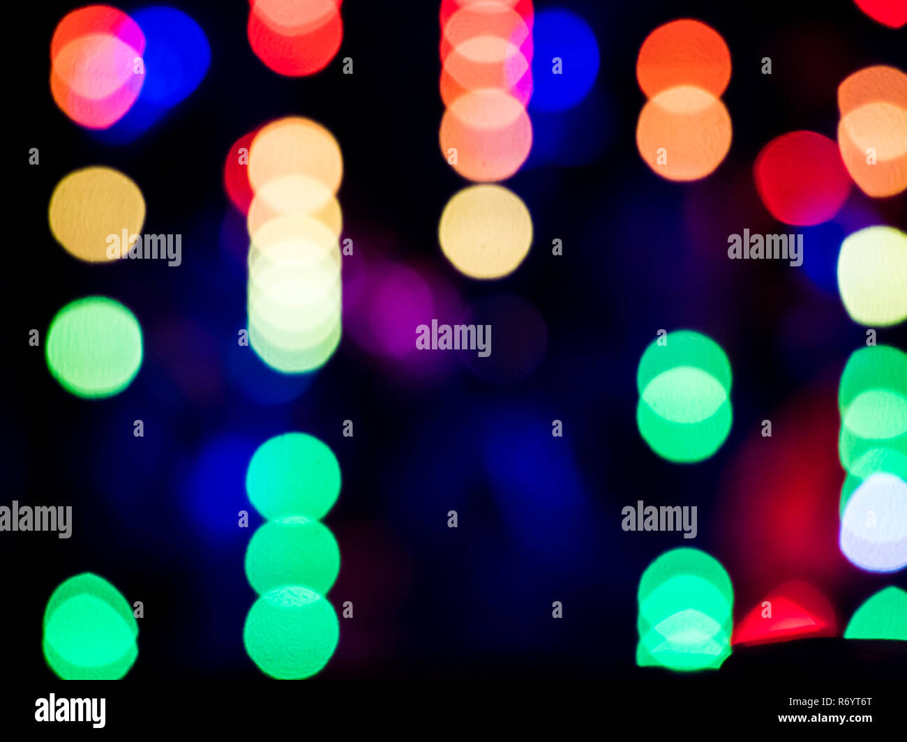 Colour blurred bokeh neon lights Stock Photo - Alamy