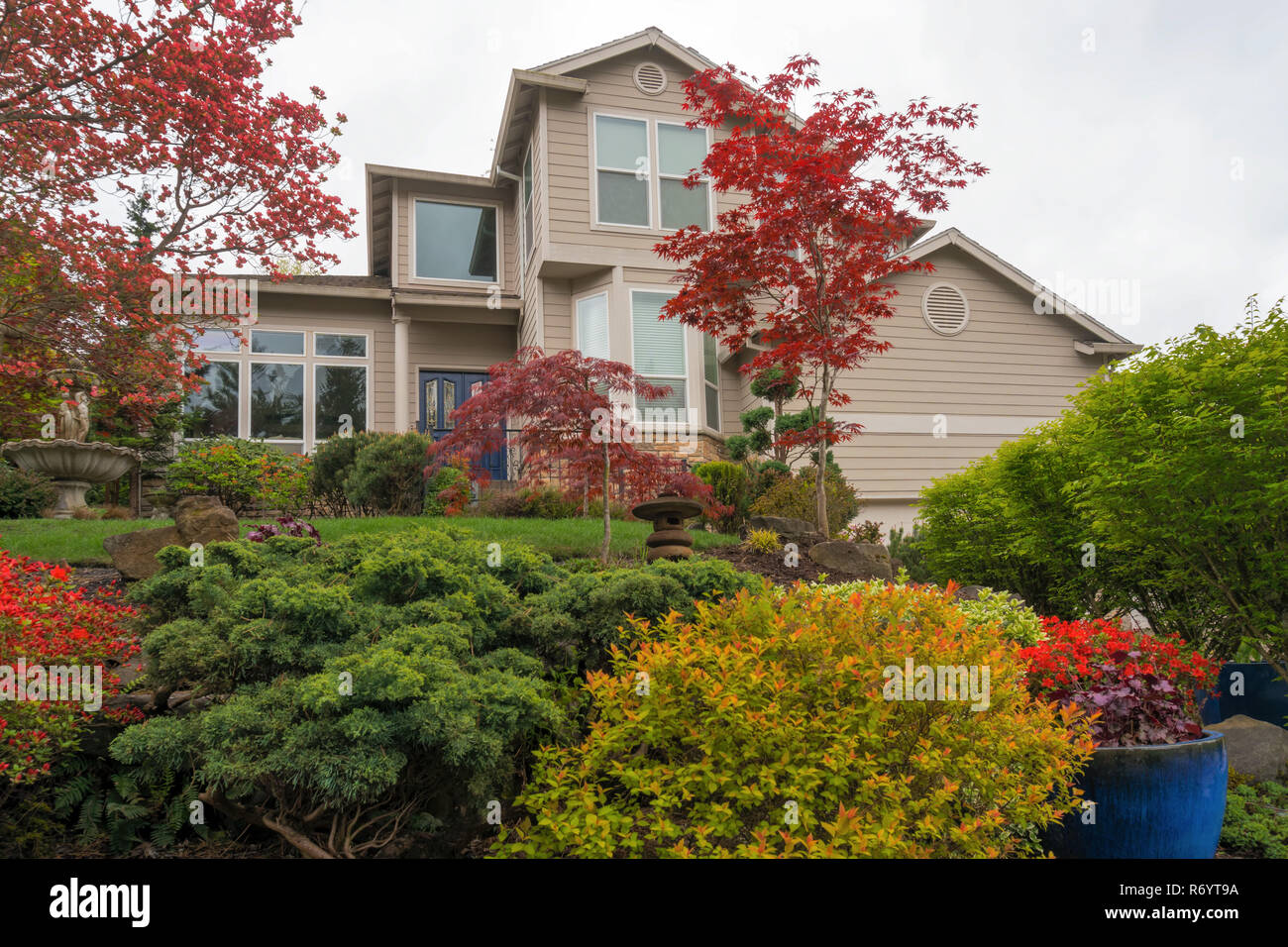 Lush Garden Landscaping in Front Yard of House Stock Photo - Alamy