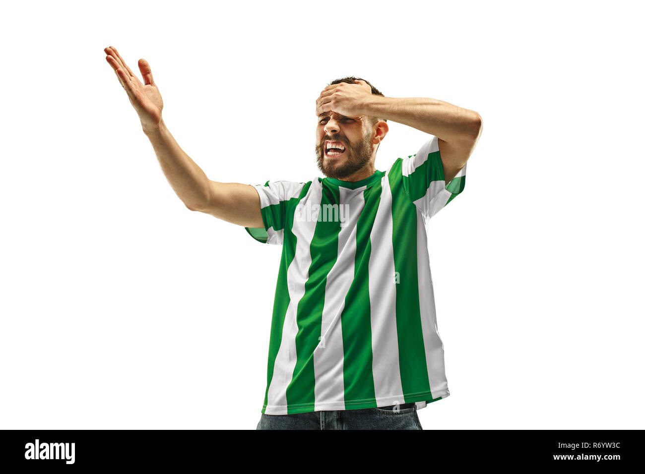 The unhappy and sad Irish fan on white background Stock Photo - Alamy