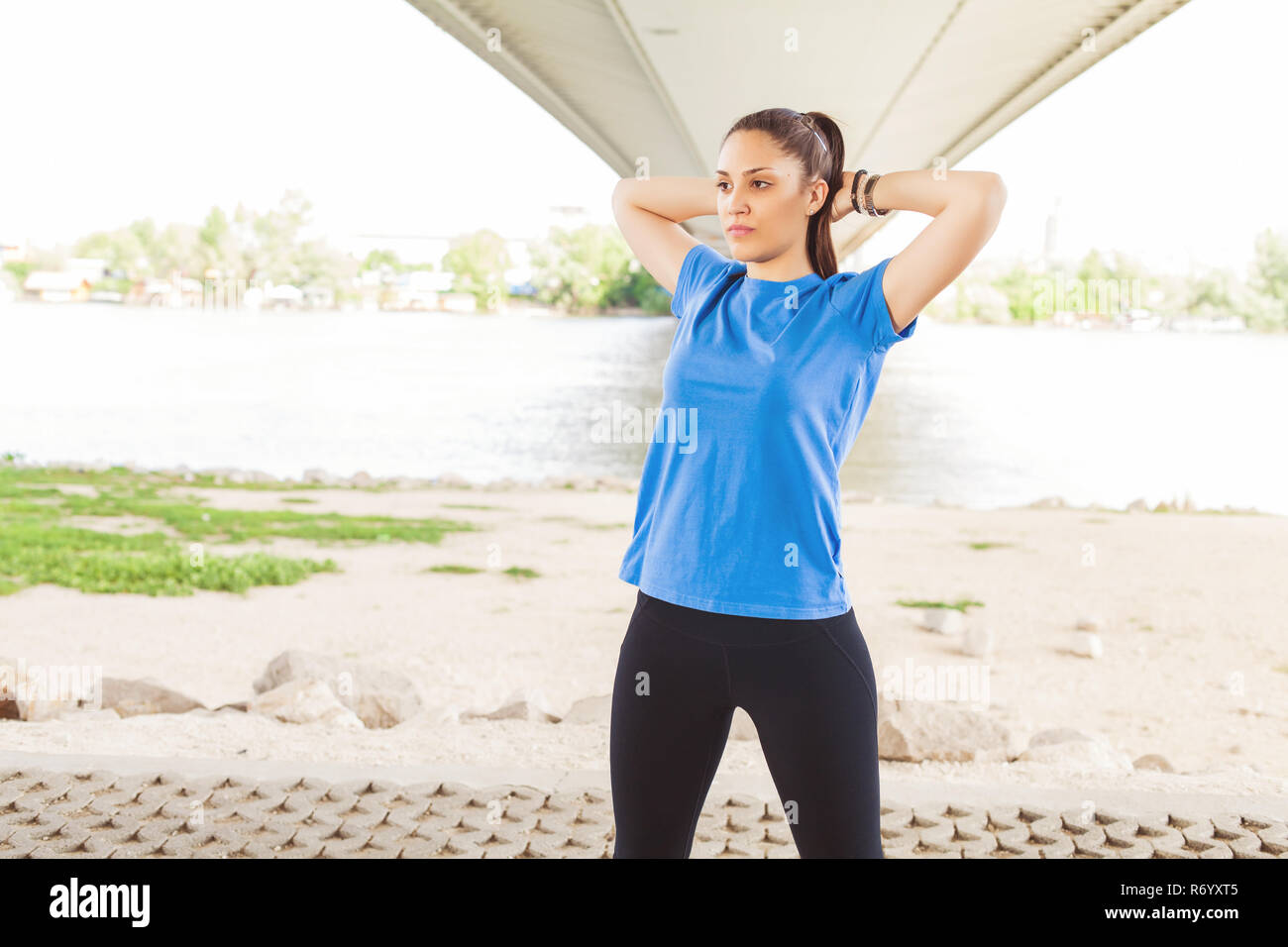 Fitness Woman doing workout outdoor Stock Photo - Alamy