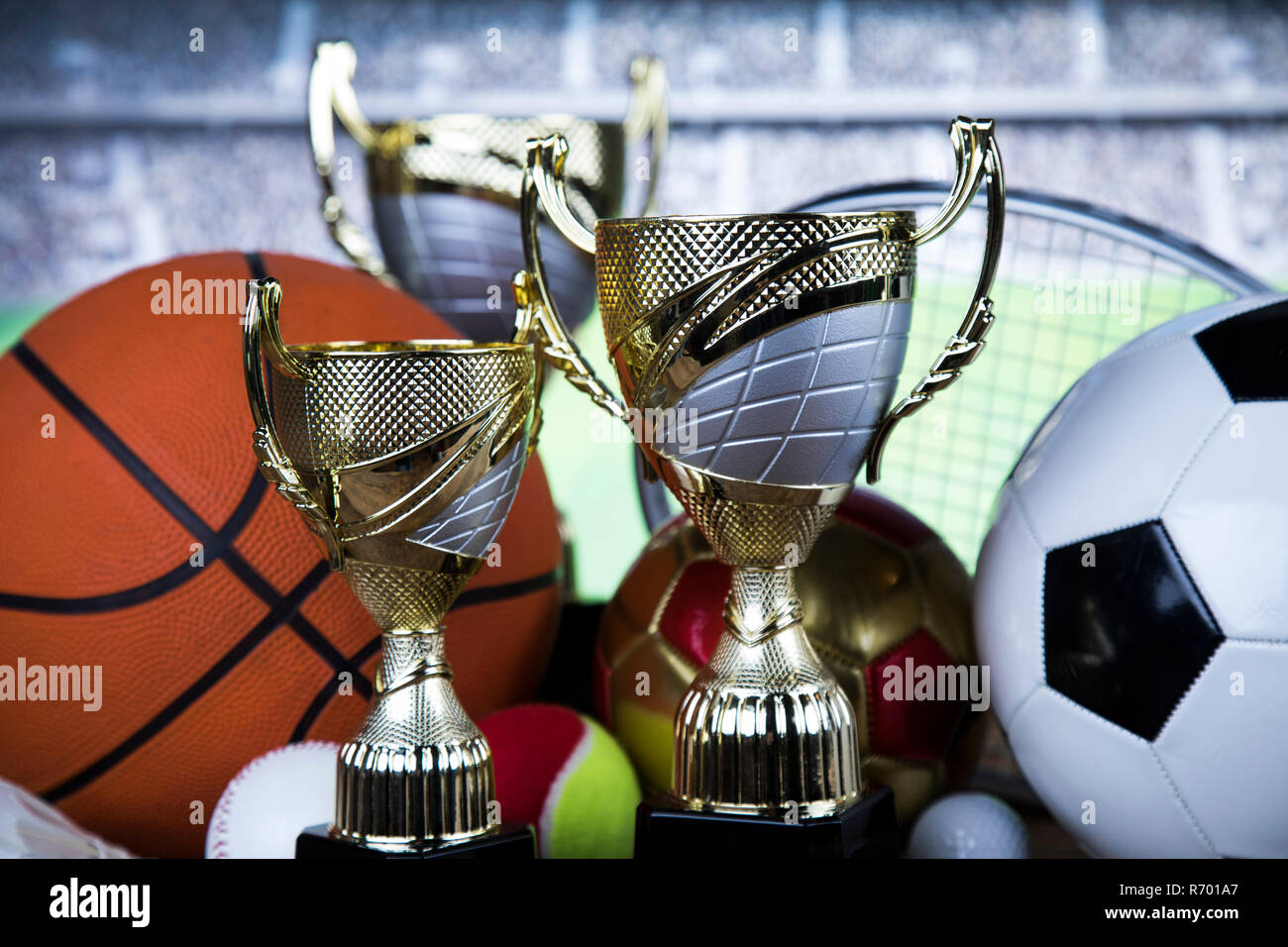 Winner trophy, Sport equipment and balls Stock Photo - Alamy