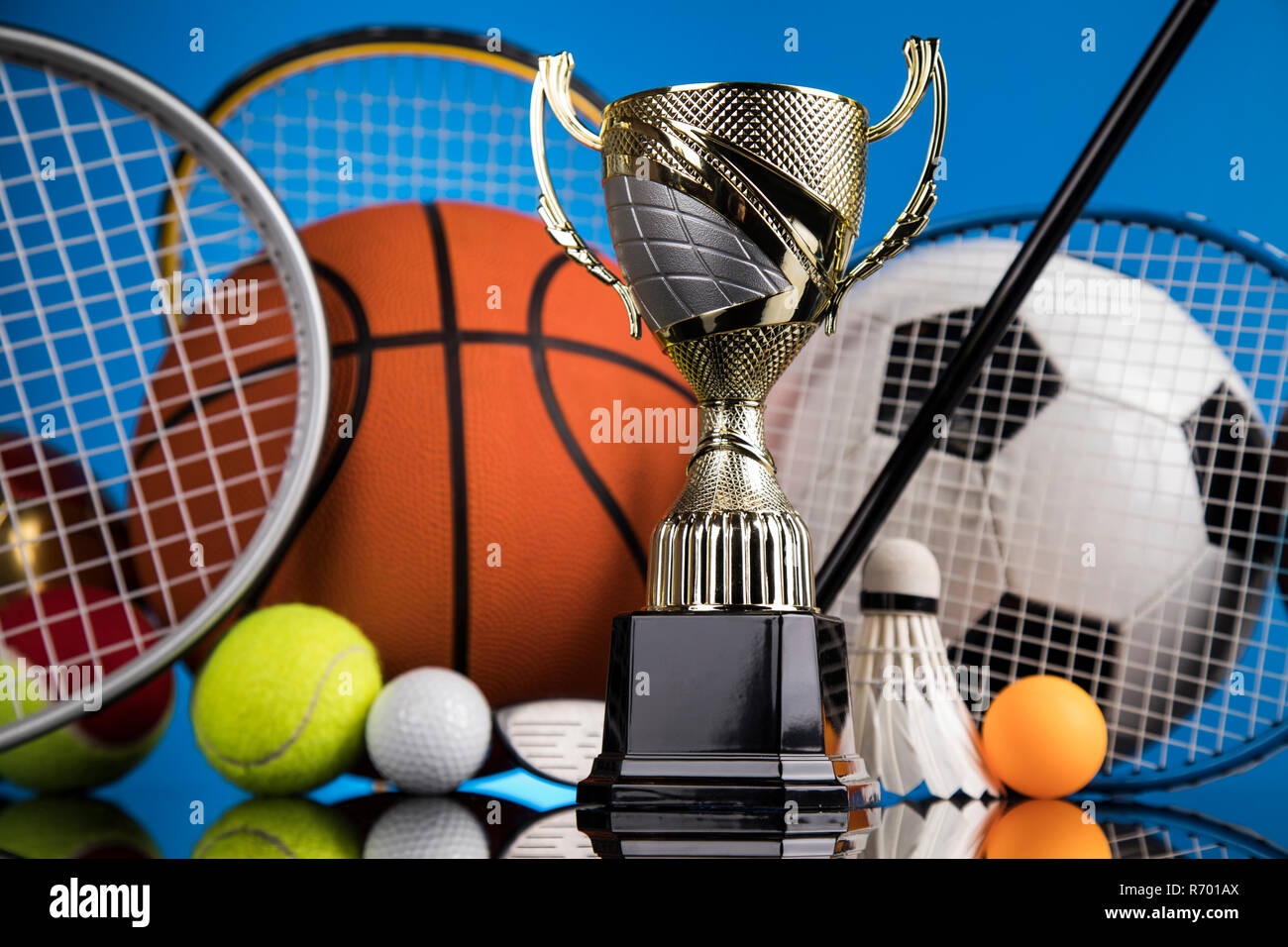 Winner trophy, Sport equipment and balls Stock Photo - Alamy
