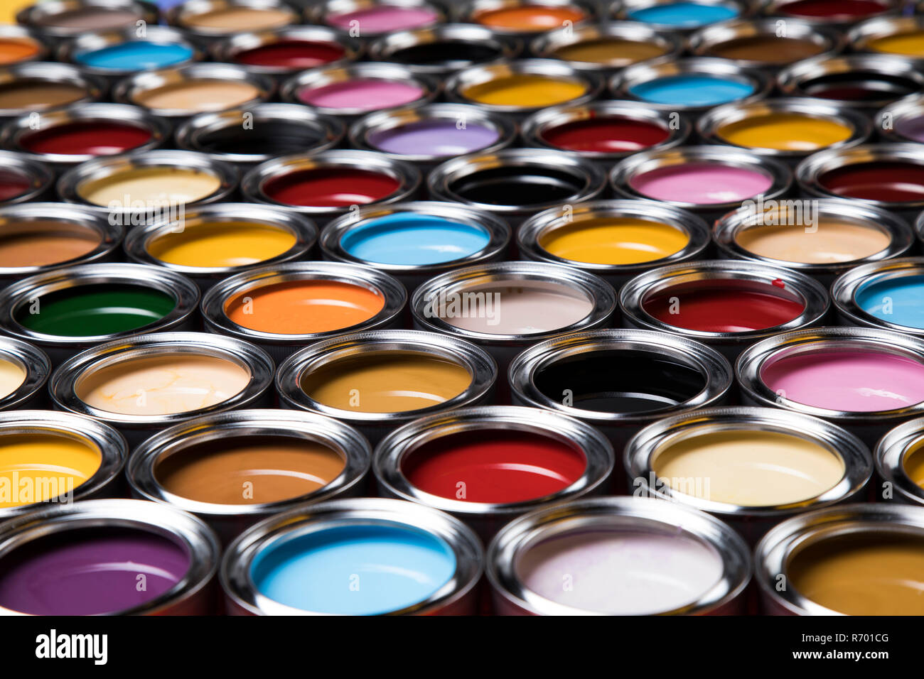 Buckets full of rainbow colored oil paint Stock Photo - Alamy
