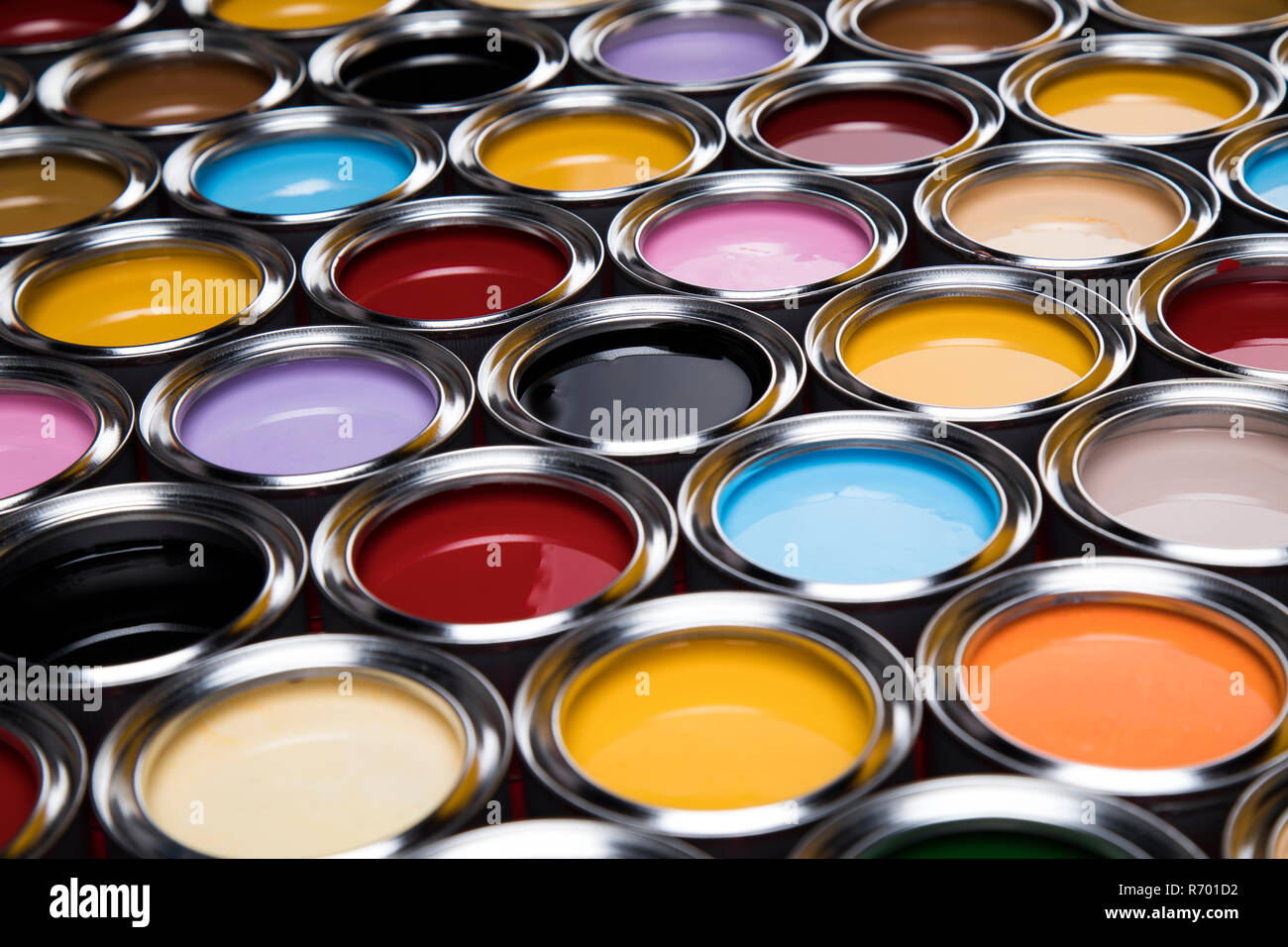 Buckets full of rainbow colored oil paint Stock Photo - Alamy
