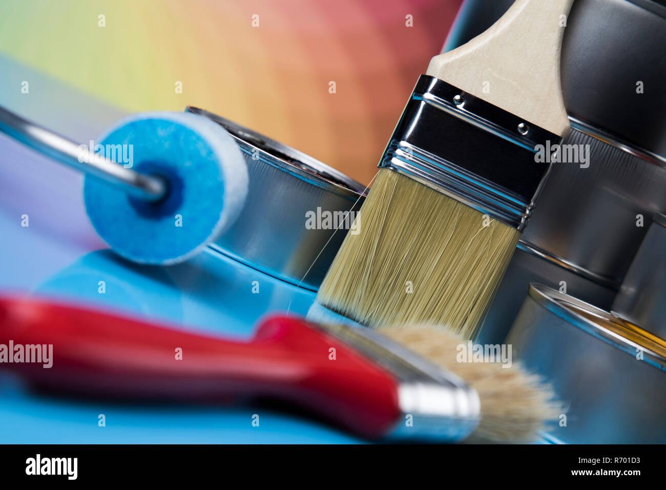 Paint brush, tin can and color guide samples Stock Photo - Alamy