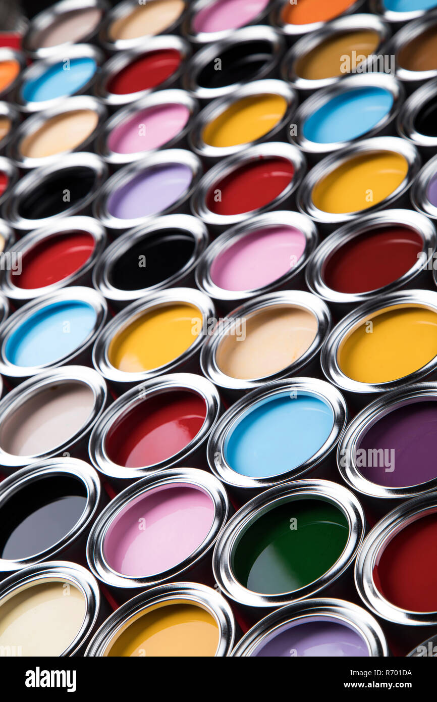 Buckets full of rainbow colored oil paint Stock Photo - Alamy